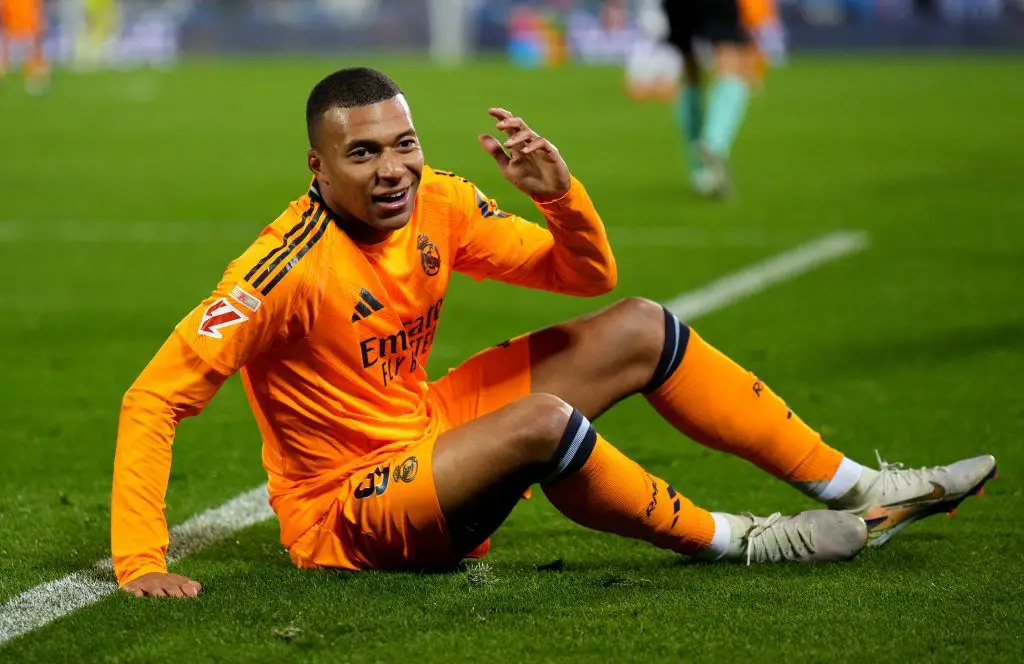 Photo: Liverpool's Virgil van Dijk turns Real Madrid star Mbappé into a ...